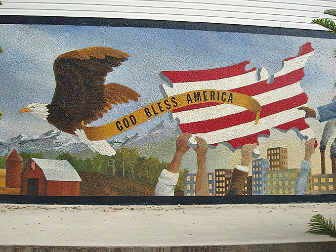 God Bless America Tribute to 911 Mural Patriotism soars across this wall where an eagle carries both national pride and collective remembrance.