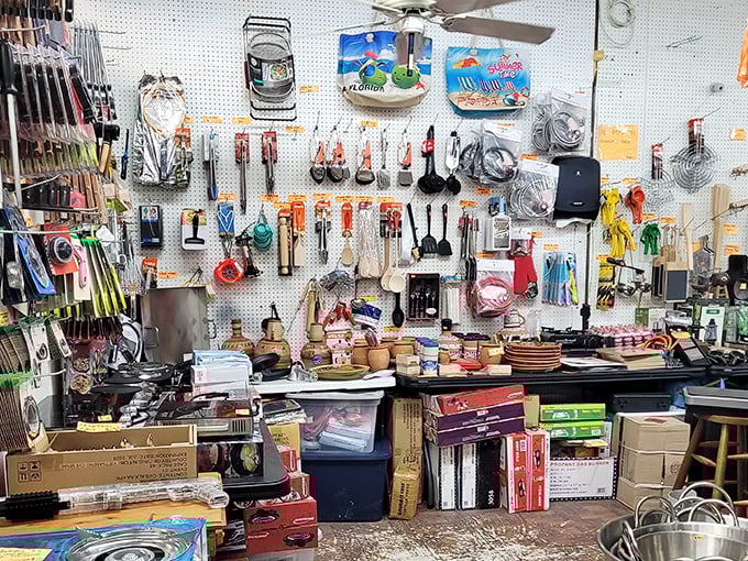 Kitchen gadgets and tools hang like culinary jewelry, promising to solve cooking problems you didn't know you had.