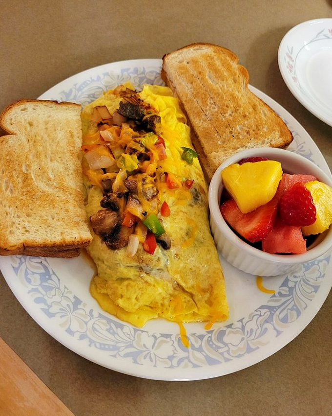 This isn't just an omelet &ndash; it's a morning masterpiece. Fresh vegetables, melty cheese, and a fruit cup that actually looks fresh!