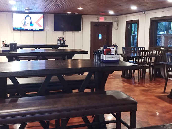 Another angle reveals the full scope of this welcoming interior, where regulars and newcomers alike find their spot and settle in happily.