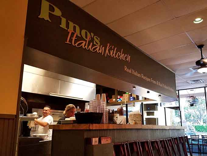 The counter area where pizza magic happens, because restaurants with nothing to hide don't hide their kitchens.