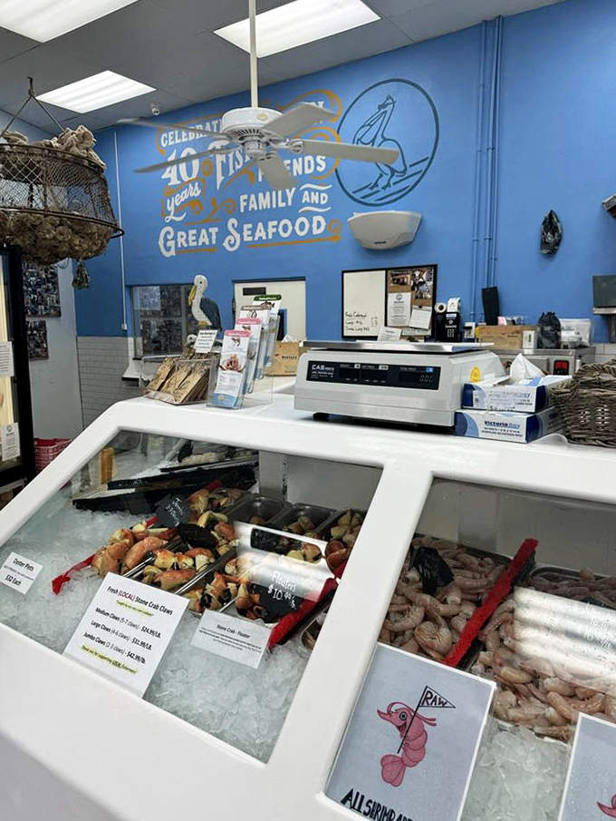 "Celebrating 40 years of family and great seafood" &ndash; the market counter where tomorrow's dinner was swimming this morning.