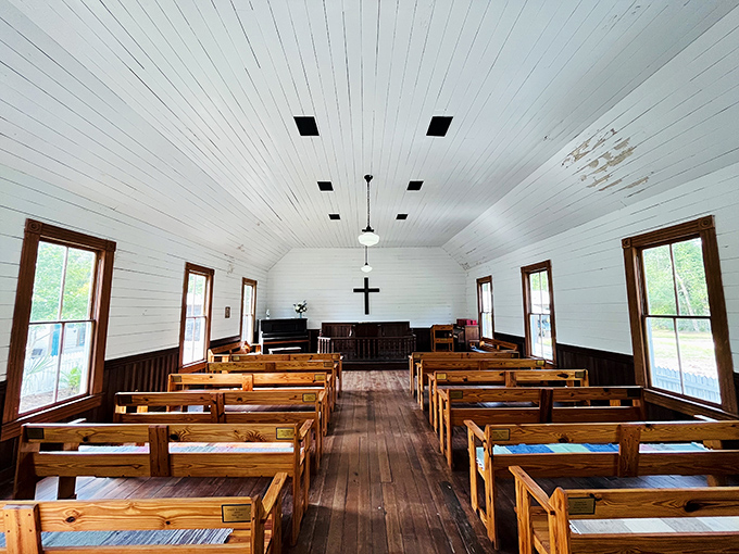 Simple wooden benches where generations sat Sunday mornings, contemplating both heaven and when lunch would be served.