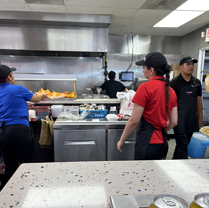 Behind every great sandwich is a dedicated team. The staff works with practiced precision, turning out consistent excellence that keeps customers coming back.
