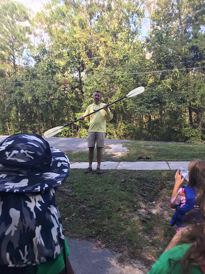 The river whisperers of TNT Hideaway share paddling wisdom before sending another lucky group into nature's embrace.