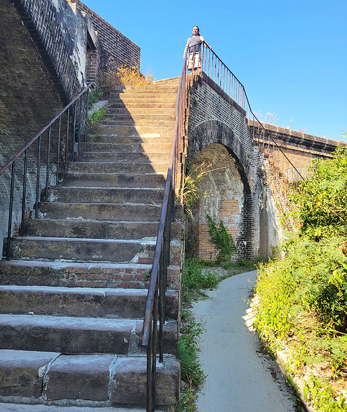 These stairs have felt the footsteps of soldiers, prisoners, and now curious visitors climbing toward spectacular Gulf views.