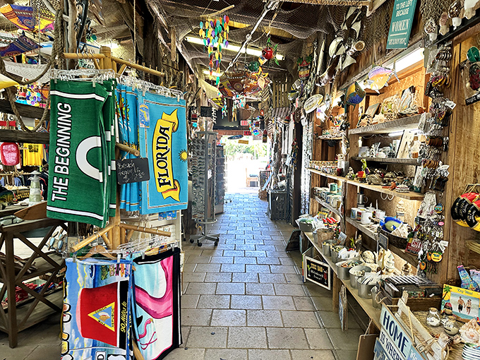 Treasure hunters navigate this narrow corridor of Florida kitsch, where souvenirs multiply like fish tales after a day on the water.