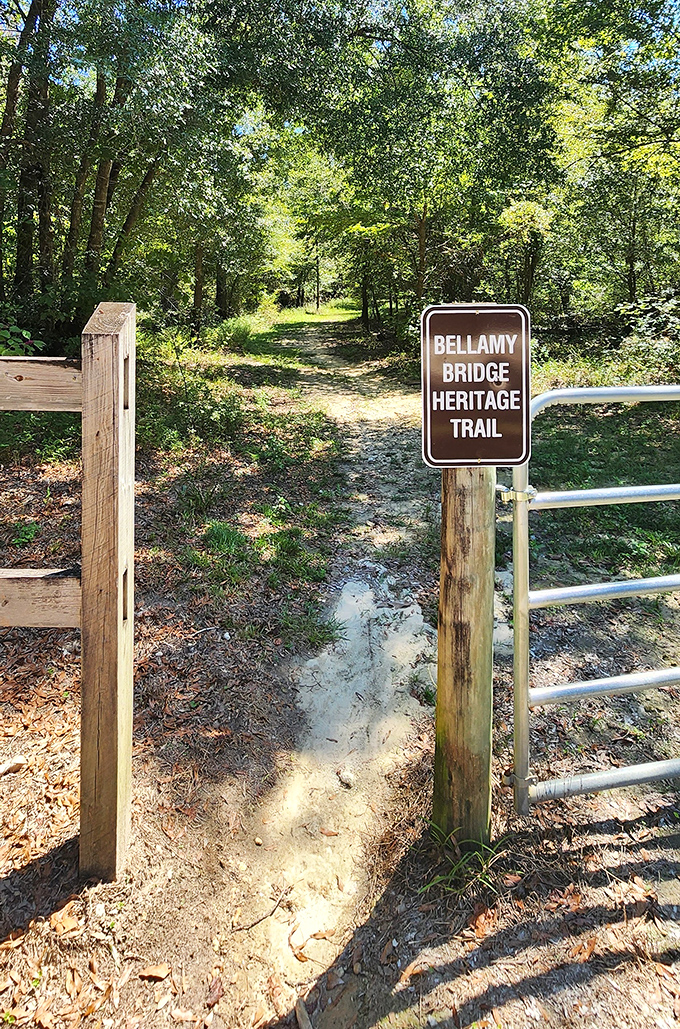 The official trailhead sign marks the beginning of an adventure that's equal parts history lesson, nature walk, and ghost hunt.