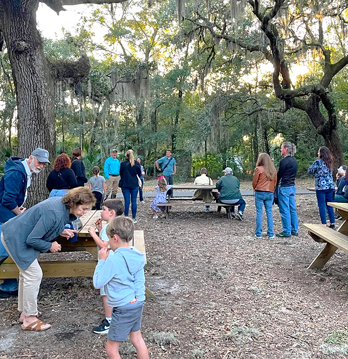 Humans in their natural habitat &ndash; gathering, chatting, and pretending they're not secretly envious of that kid's boundless energy.