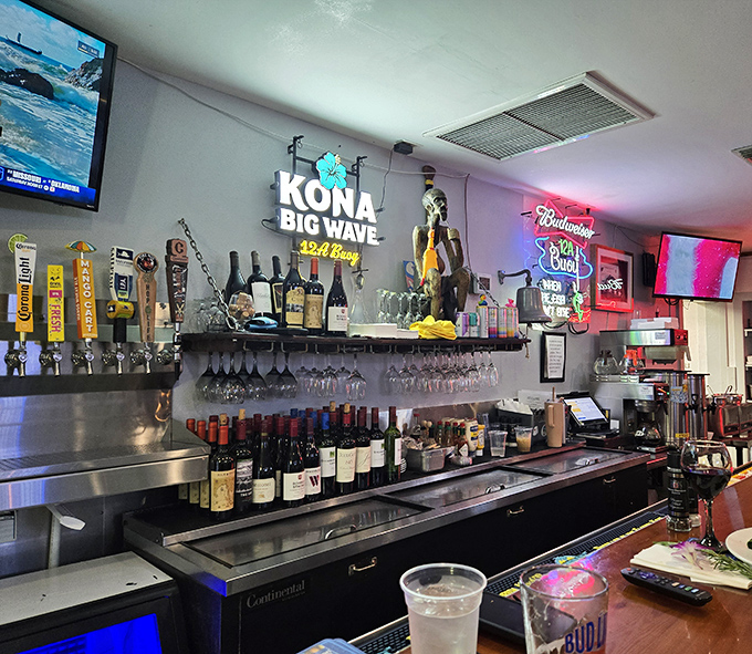 The well-stocked bar stands ready to quench thirsts with everything from local craft beers to tropical-inspired cocktails.