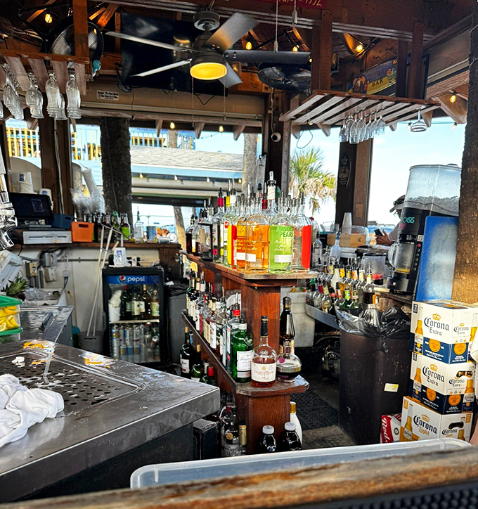 The bar area &ndash; where local spirits meet ocean views and bartenders craft cocktails with the rhythm of the nearby waves.