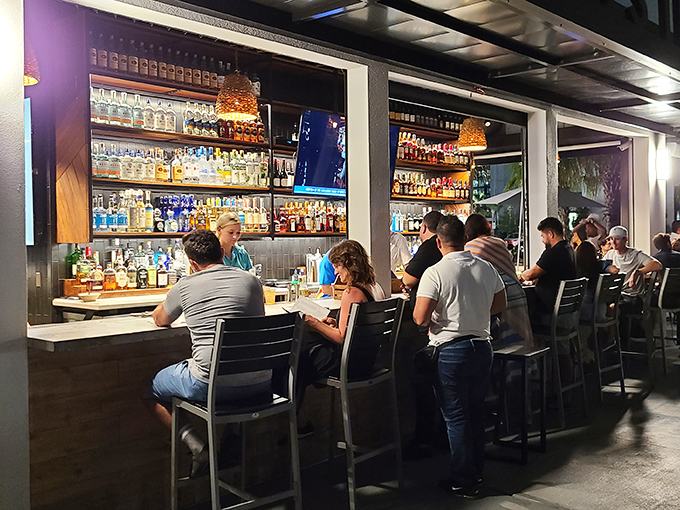 The bar at Ulele isn't just where drinks are served &ndash; it's a social hub where craft cocktails and conversations flow freely into the evening.