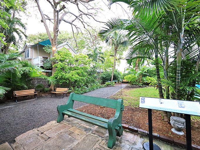 Garden benches invite visitors to sit awhile and soak in the literary atmosphere. Just check for napping cats before you sit down.