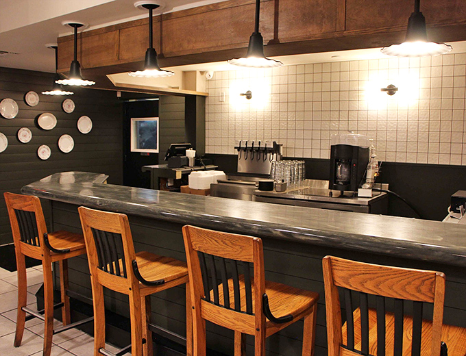 Where regulars perch to watch culinary magic happen &ndash; the best seats in the house for food enthusiasts.