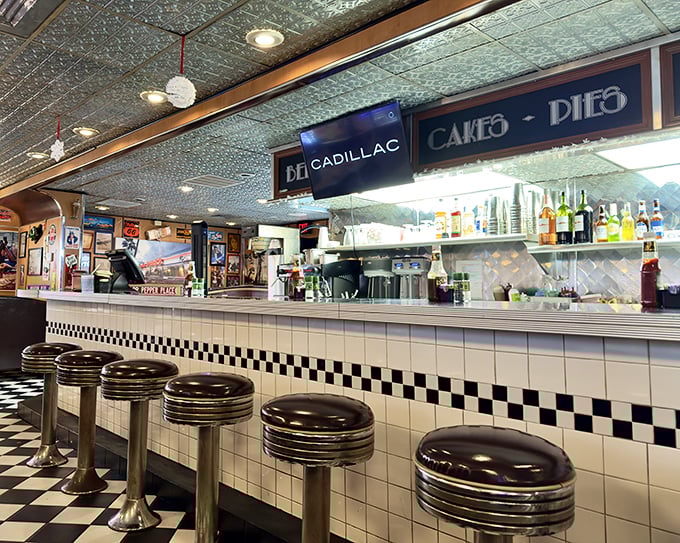 The counter seating offers front-row tickets to the culinary choreography happening behind it &ndash; short-order cooking elevated to performance art.
