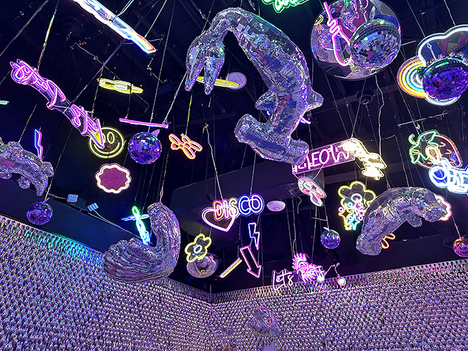 Disco never died&mdash;it just moved to the ceiling at Fairgrounds. These neon sculptures transform nightlife into a floating art form.