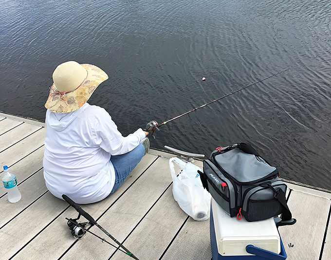 Sometimes the best fishing happens right on the dock, where you sit close to the water and it becomes easy to settle in and enjoy the moment.