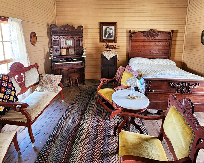 This elegantly appointed room showcases the Victorian-era furnishings that represented the height of frontier luxury, complete with organ and handcrafted furniture.