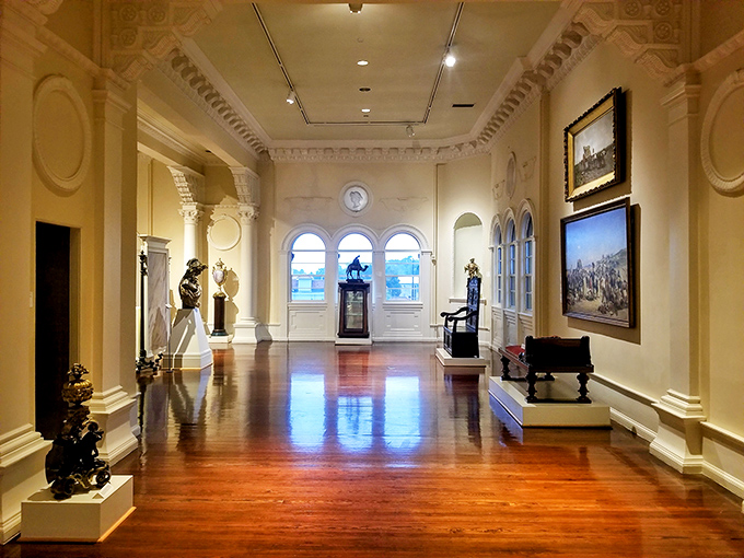 Polished hardwood floors and classical architecture create a refined backdrop for the museum's diverse collection of art and historical artifacts.