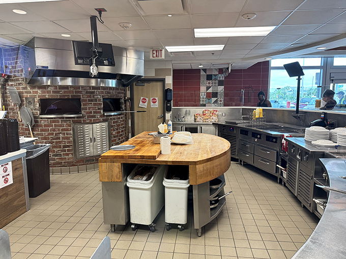 Behind the scenes in the open kitchen, where pasta, pizza, and other secret menu items come to life under watchful eyes.