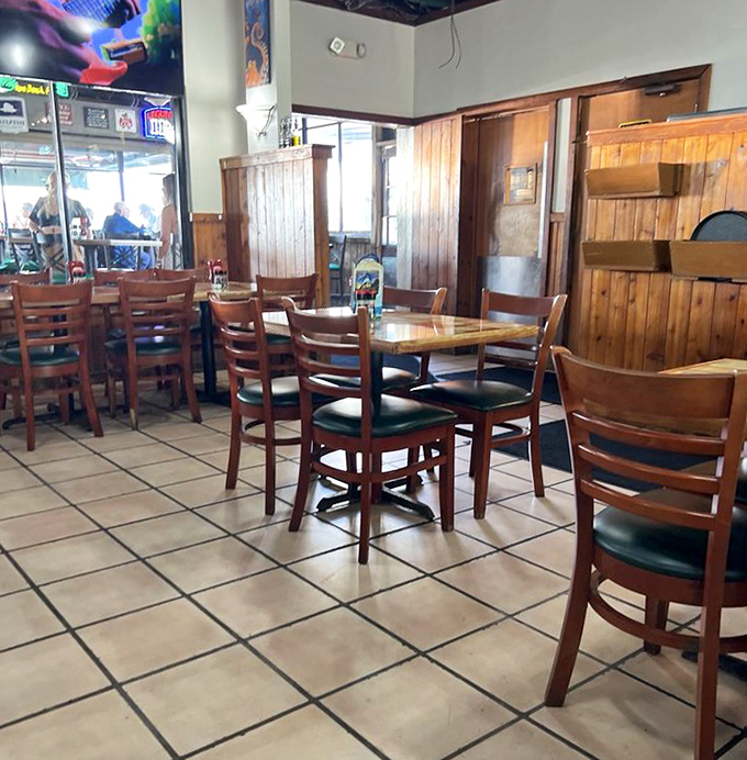 The dining room offers respite from Florida's occasional weather tantrums without sacrificing those million-dollar lagoon views.