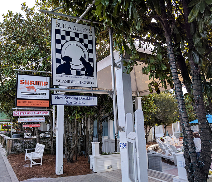 Signage: A charming welcome to seafood paradise &ndash; the black and white checkered sign promises good times before you even step inside.