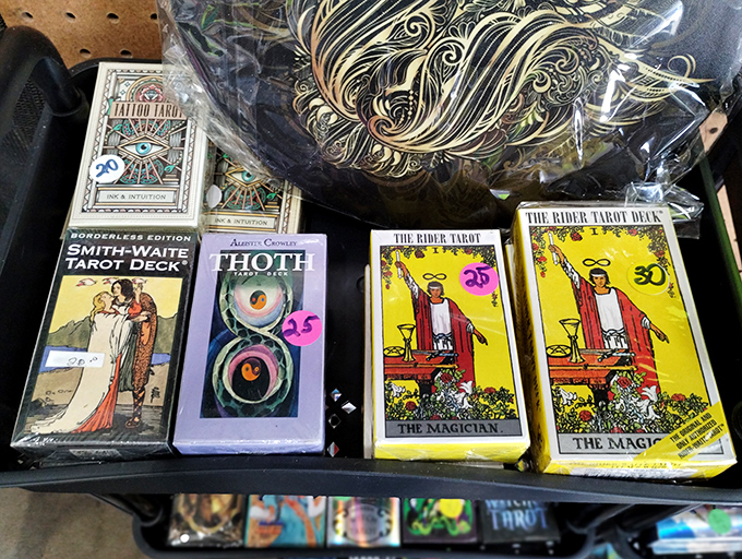 Tarot decks promising glimpses into the future sit patiently on display, their mystical imagery beckoning those curious about what lies beyond the veil.