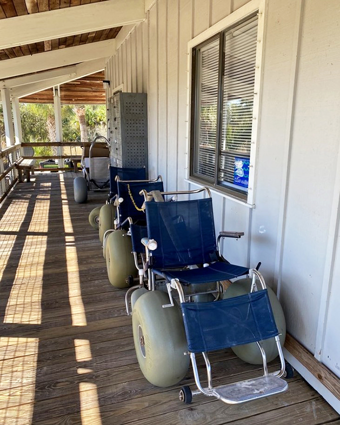 Beach wheelchairs with balloon tires stand ready, because paradise should be accessible to everyone, not just those steady on sand.