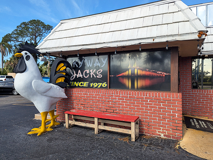 Skyway Jack's whimsical giant chicken statue stands guard outside, a quirky landmark that hints at the no-frills, all-flavor experience waiting inside.