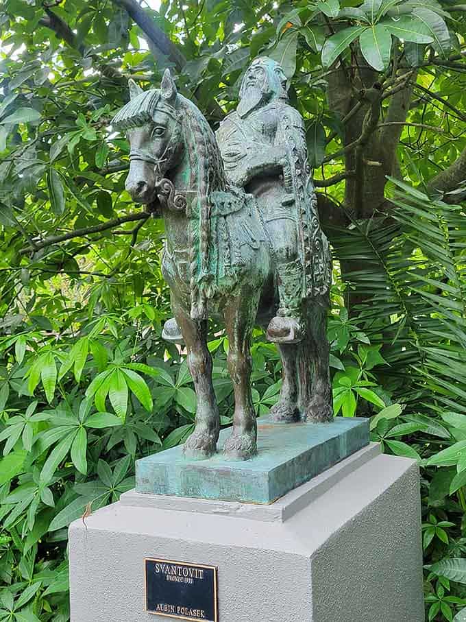 A mounted warrior from Slavic mythology surveys the gardens, looking slightly confused about ending up in subtropical Florida.