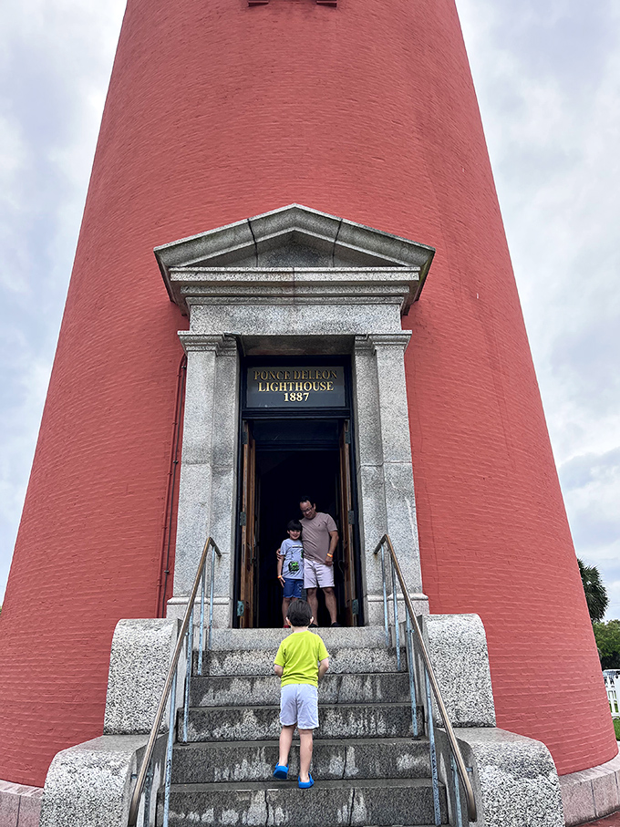 Curious explorers ascend the historic entrance, beginning their journey through time in this magnificent maritime landmark.