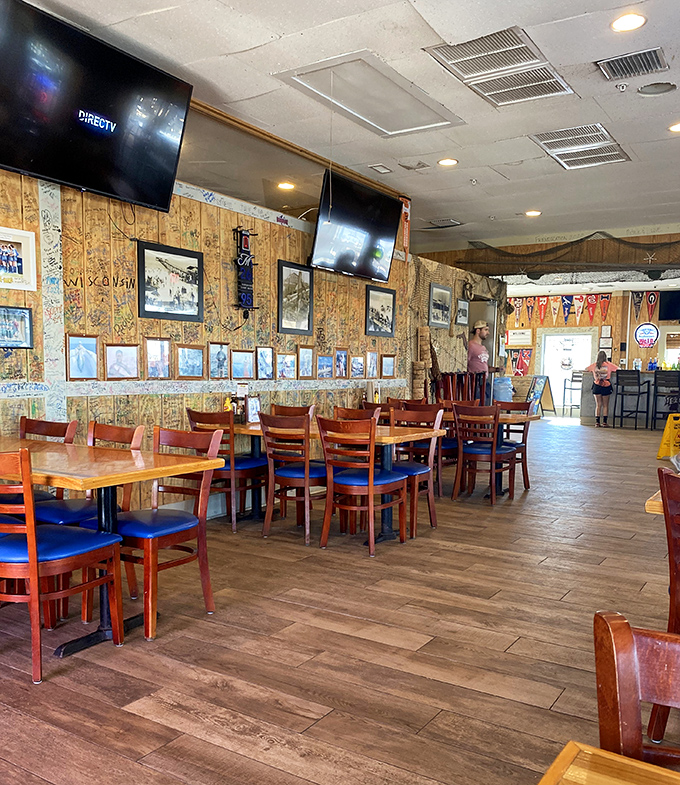 Wooden floors worn smooth by dancing feet and walls covered in memorabilia create an atmosphere of comfortable, organized chaos.