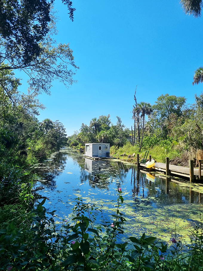 Reflections of Florida's past mirror in still waters near the park, where natural beauty complements historical exploration.