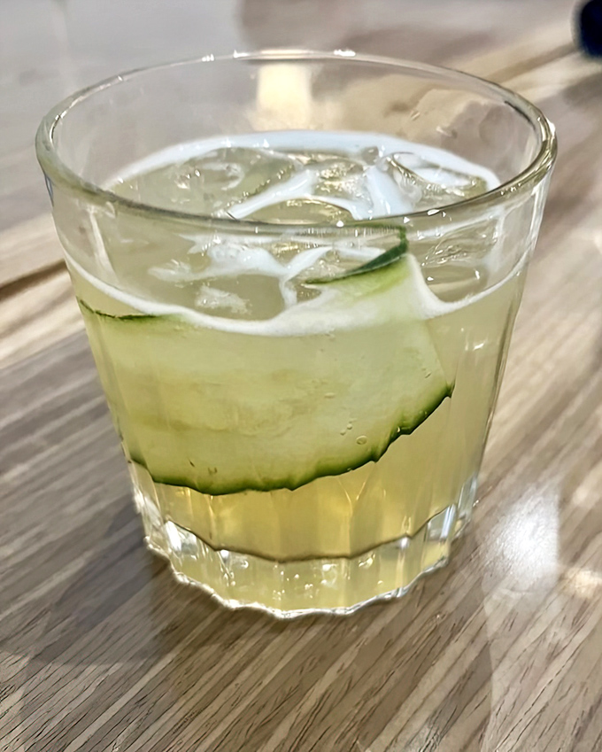 Cucumber and ice dance refreshingly in a glass that promises relief from Florida's famous humidity.
