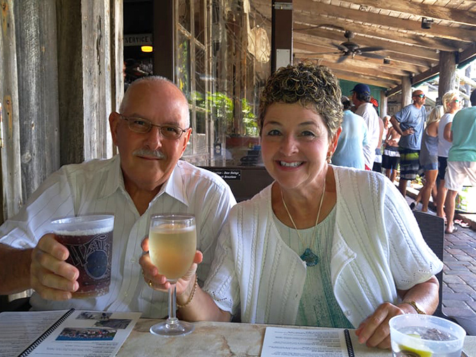 Happy diners raising glasses to good company and better views &ndash; the true Florida experience doesn't get more authentic than this.