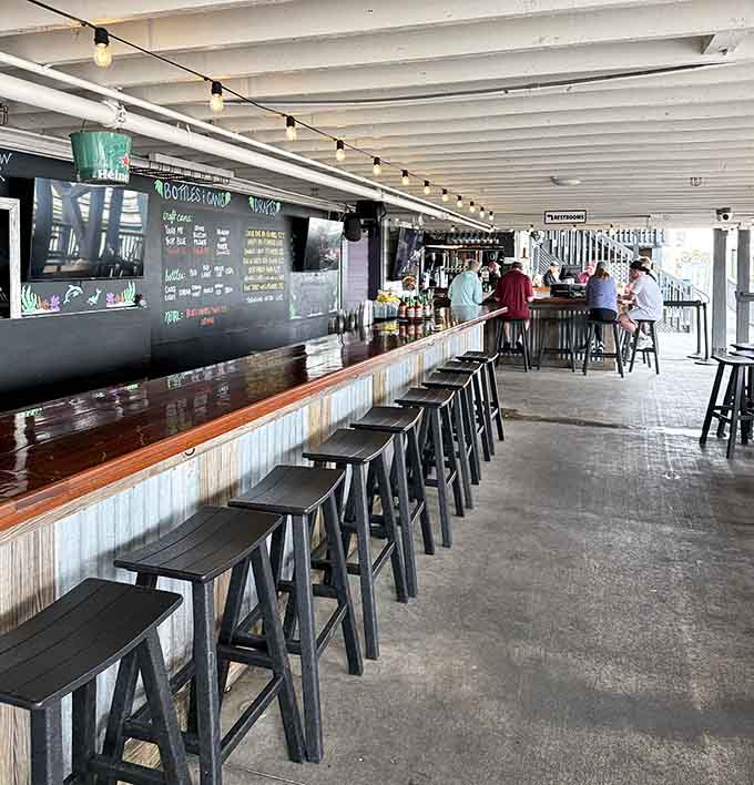 The covered outdoor bar area offers the best of both worlds: fresh air and protection from Florida's occasional mood swings.