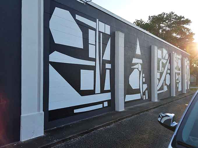 Abstract geometric patterns in black and white create optical illusions that might make you dizzy, but in an artsy way that feels intentional.