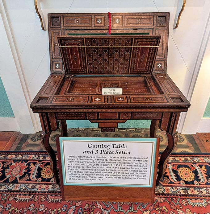 Nine years in the making, this gaming table showcases thousands of individual wood pieces, creating a masterpiece of patience and precision.