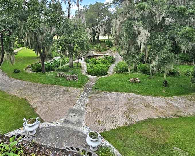 An aerial view reveals the thoughtful layout of gardens and pathways, designed to create moments of discovery and contemplation throughout the property.