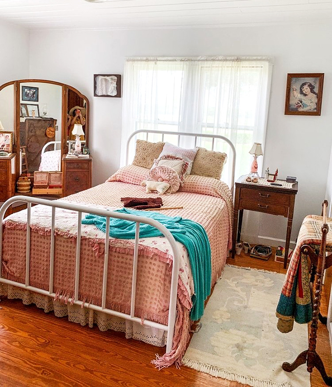 Vintage bedroom where dreams were dreamed on iron beds, surrounded by handcrafted furniture that puts today's assembly-required stuff to shame.