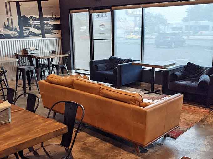 Comfortable couches provide the perfect spot to lounge while contemplating your next slice or planning your return visit.