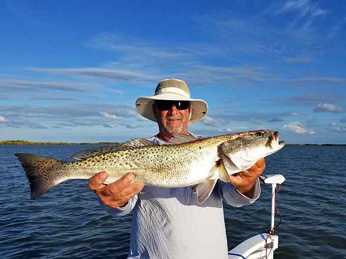 That smile says it all when you land a beautiful speckled trout in waters that have been feeding fishermen for thousands of years.