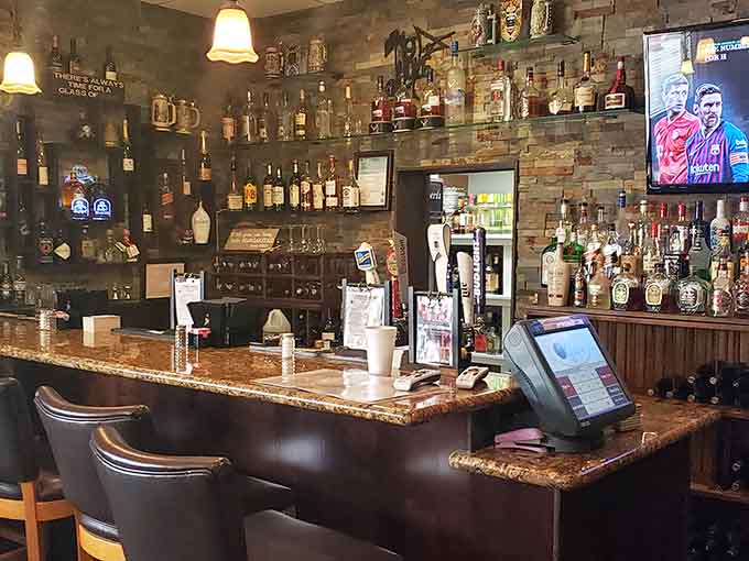 The well-stocked bar offers everything from craft cocktails to cold beer, all served with that signature Olympic friendliness.