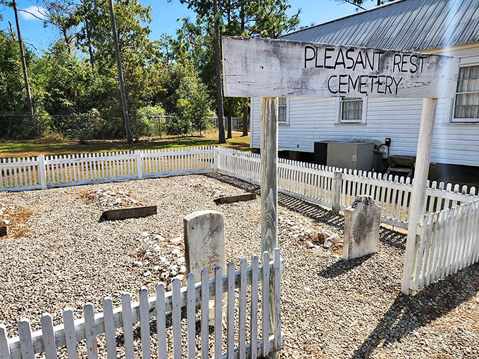 Pleasant Rest Cemetery's weathered markers and white picket fence tell poignant stories of lives cut short by hardships we've forgotten in our modern comfort.