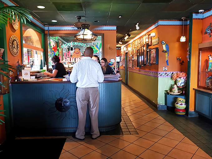 The reception area's vibrant colors and playful decor set the tone for the flavor fiesta that awaits beyond.