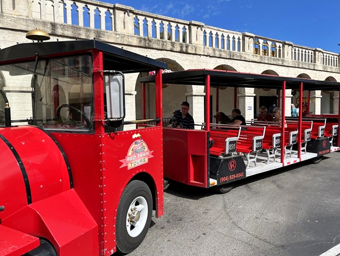 The cheerful Red Train awaits outside Ripley's, ready to transport visitors through the historic streets of America's oldest city.