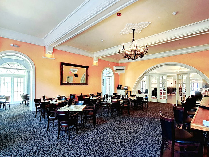 Restaurant Dining Area: Peach walls embrace diners in a warm glow, while tables stand ready for everything from power breakfasts to romantic dinners that stretch into midnight.