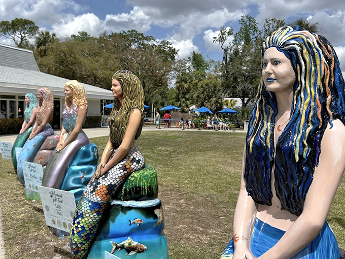 A colorful lineup of mermaid statues offers perfect photo opportunities, each with her own personality and slightly quirky charm.