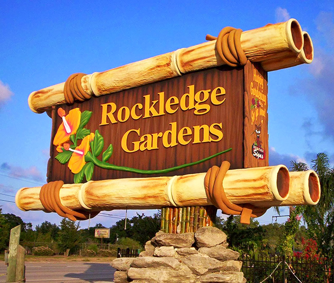 The iconic Rockledge Gardens sign stands as a bamboo beacon for plant enthusiasts and curious travelers alike.