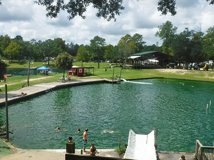 The swimming area transforms into a community gathering spot during summer, where strangers become friends over shared appreciation of natural springs.